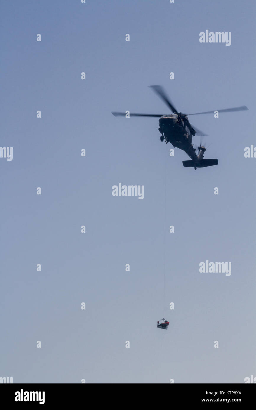 Soldiers of the 42nd Combat Aviation Brigade (CAB) work with Army ...