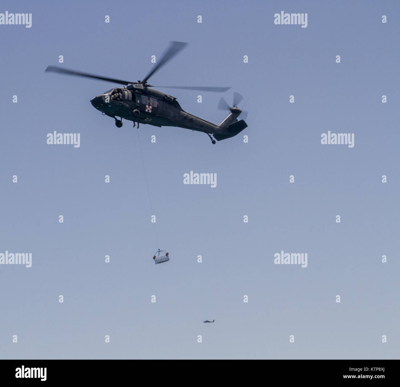 Soldiers of the 42nd Combat Aviation Brigade (CAB) work with Army ...