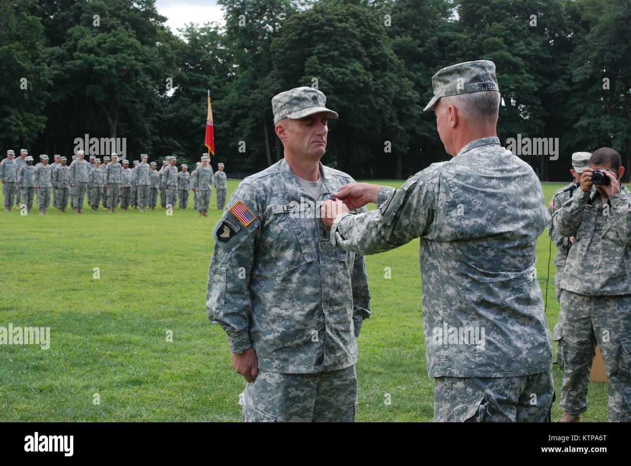 CAMP SMITH-- Command Sgt. Major Justin Lenz receives the Combat Action ...