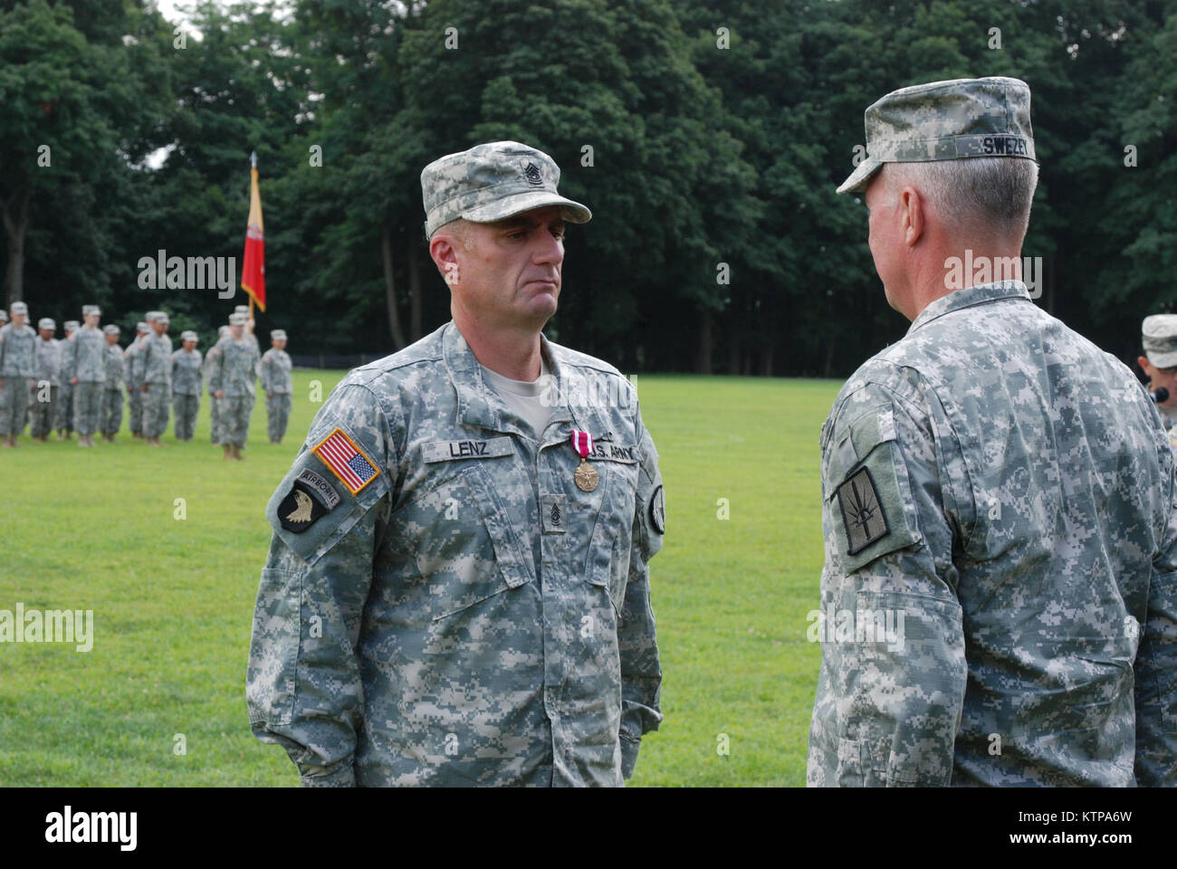 CAMP SMITH-- Command Sgt. Major Justin Lenz receives the Combat Action ...