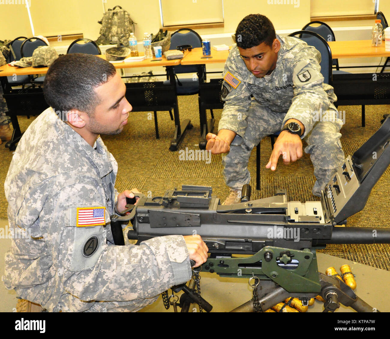 New York Army National Guard Staff Sgt. Juan Torres (right), an ...