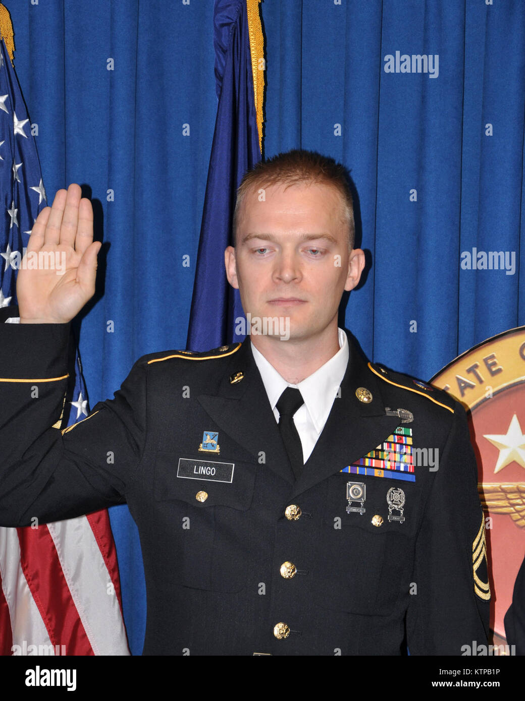 Newly appointed JAG officers recite their Oath of Office during a ...