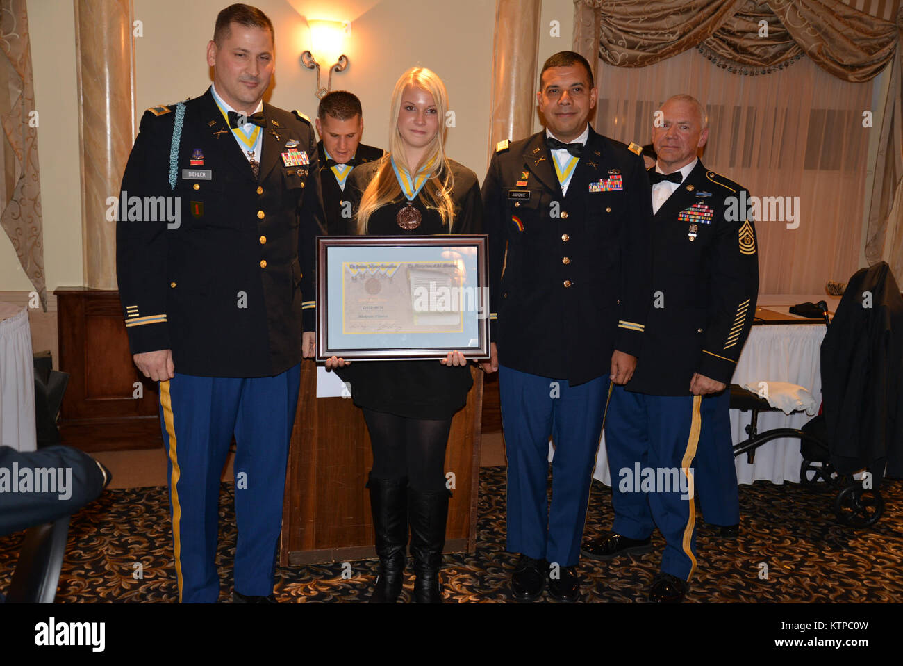SYRACUSE, NY--Mackenzie Waterson, 2nd from the left, after receiving ...