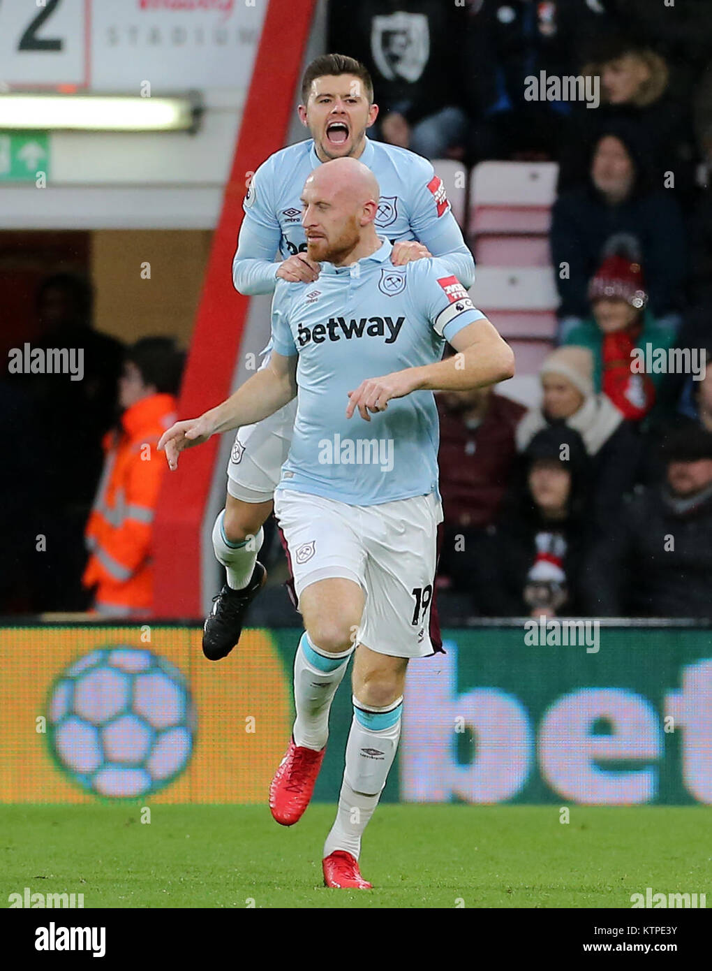 West Ham United's James Collins (front) celebrates scoring his side's ...