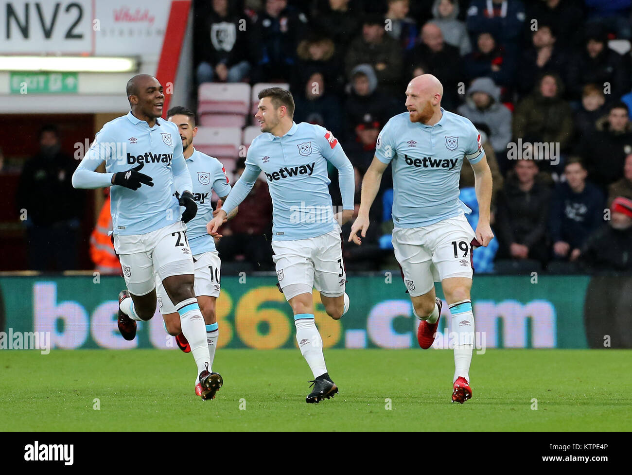 West Ham United's James Collins (right) celebrates scoring his side's ...