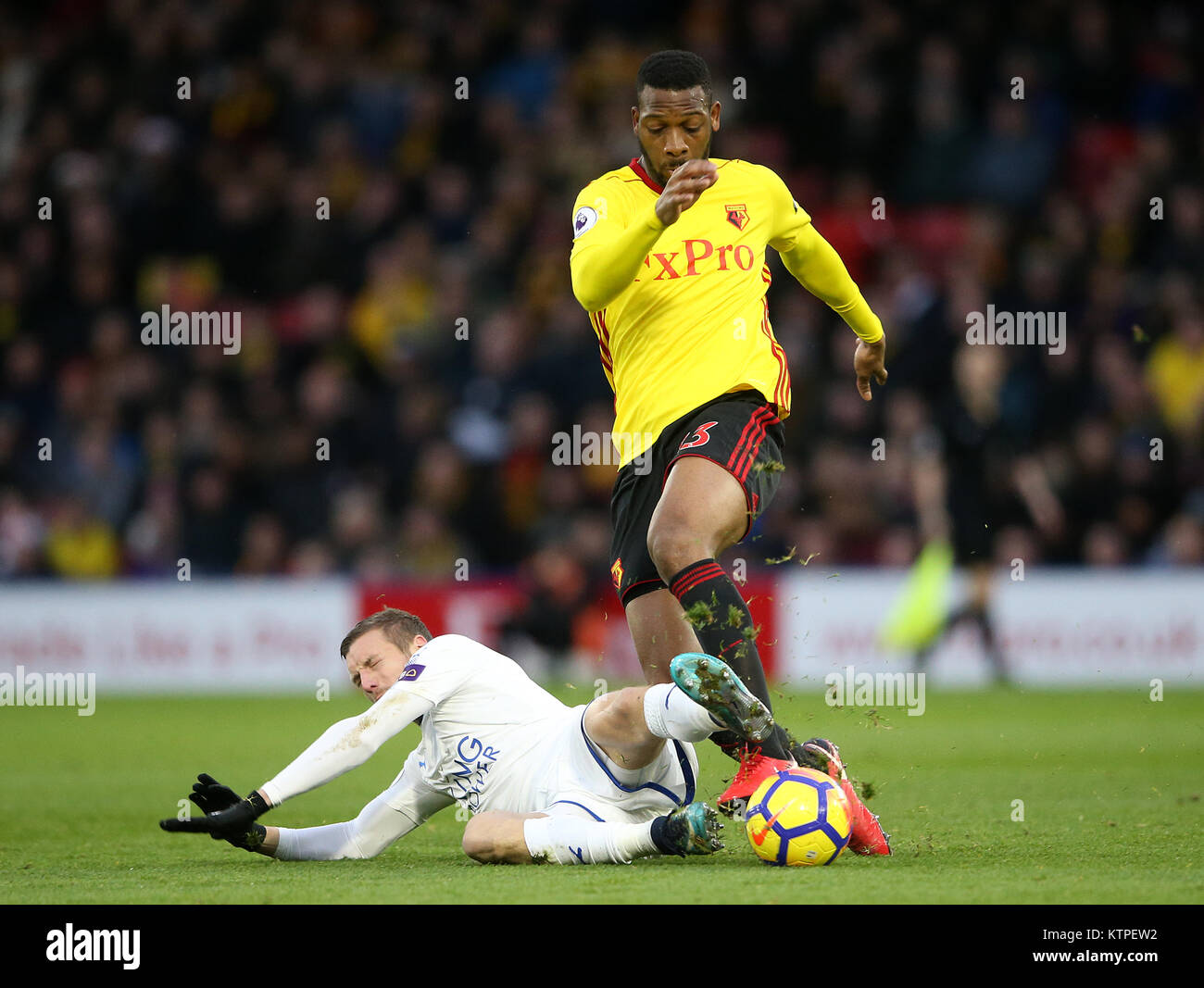 Leicester City's Jamie Vardy (left) and Watford's Molla Wague battle ...