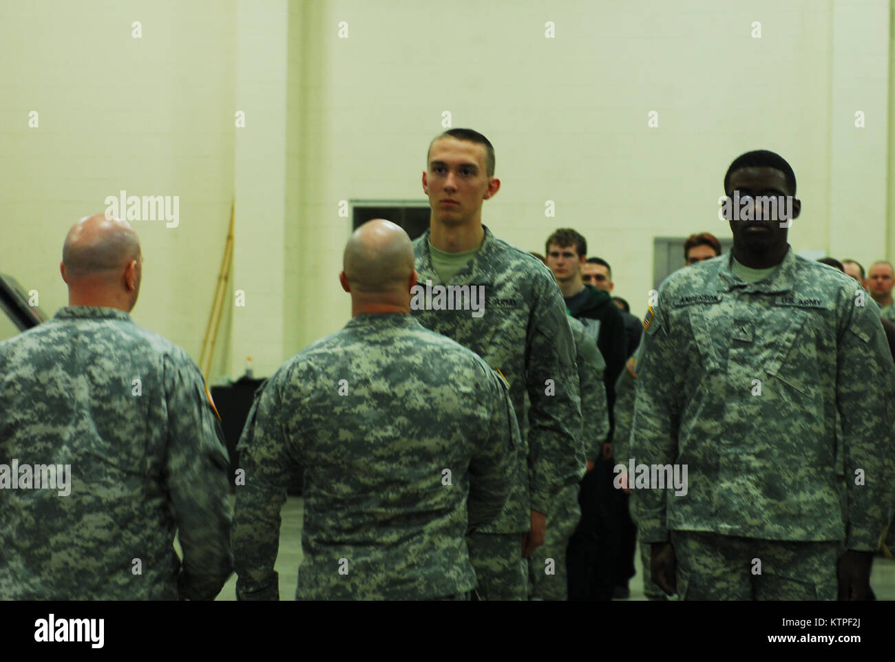 SYRACUSE, NY-- Recruits and new Soldiers lined up for a battle hand-off ...