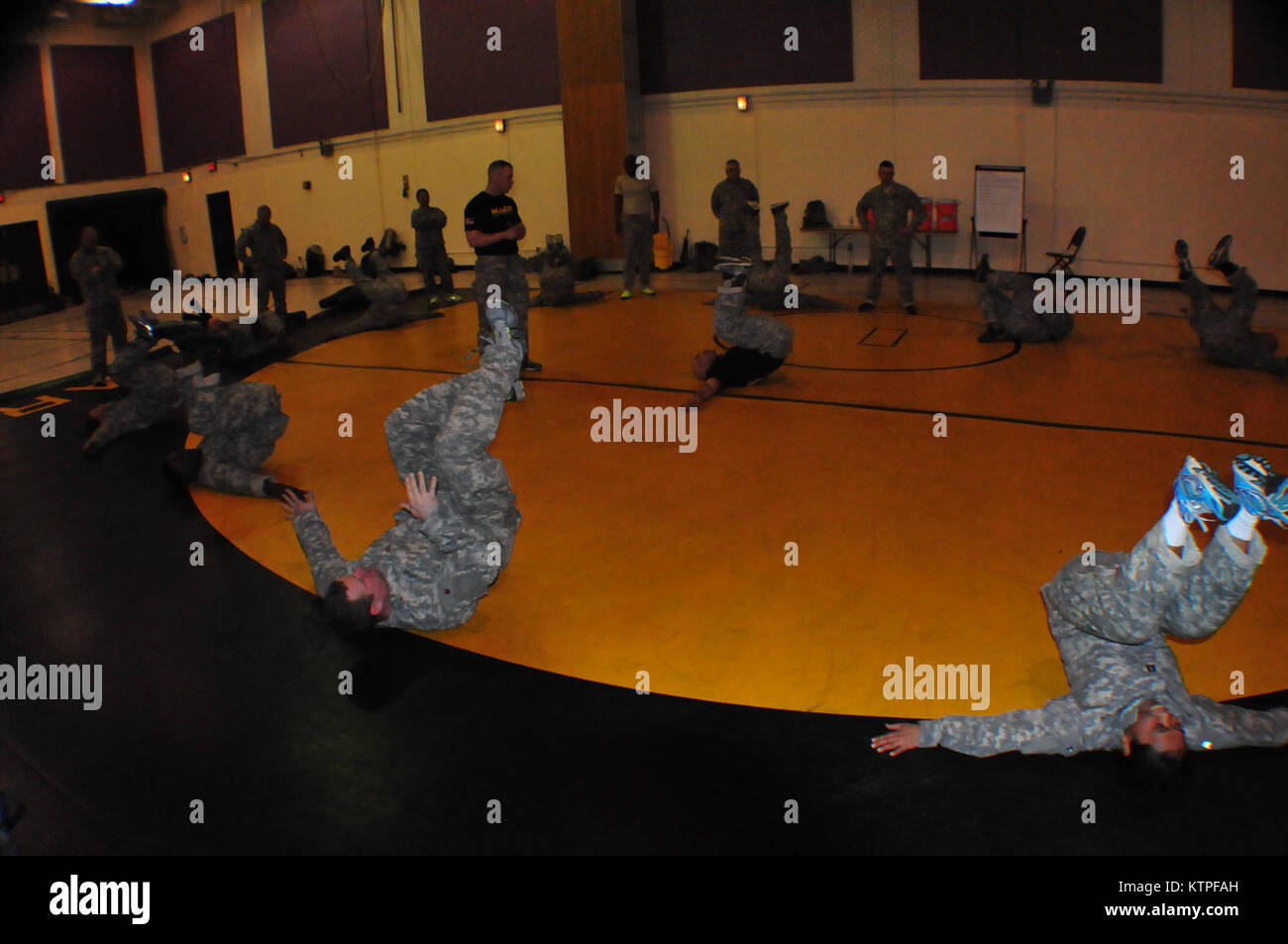 42nd Infantry soldiers practice falling backwards using the ...