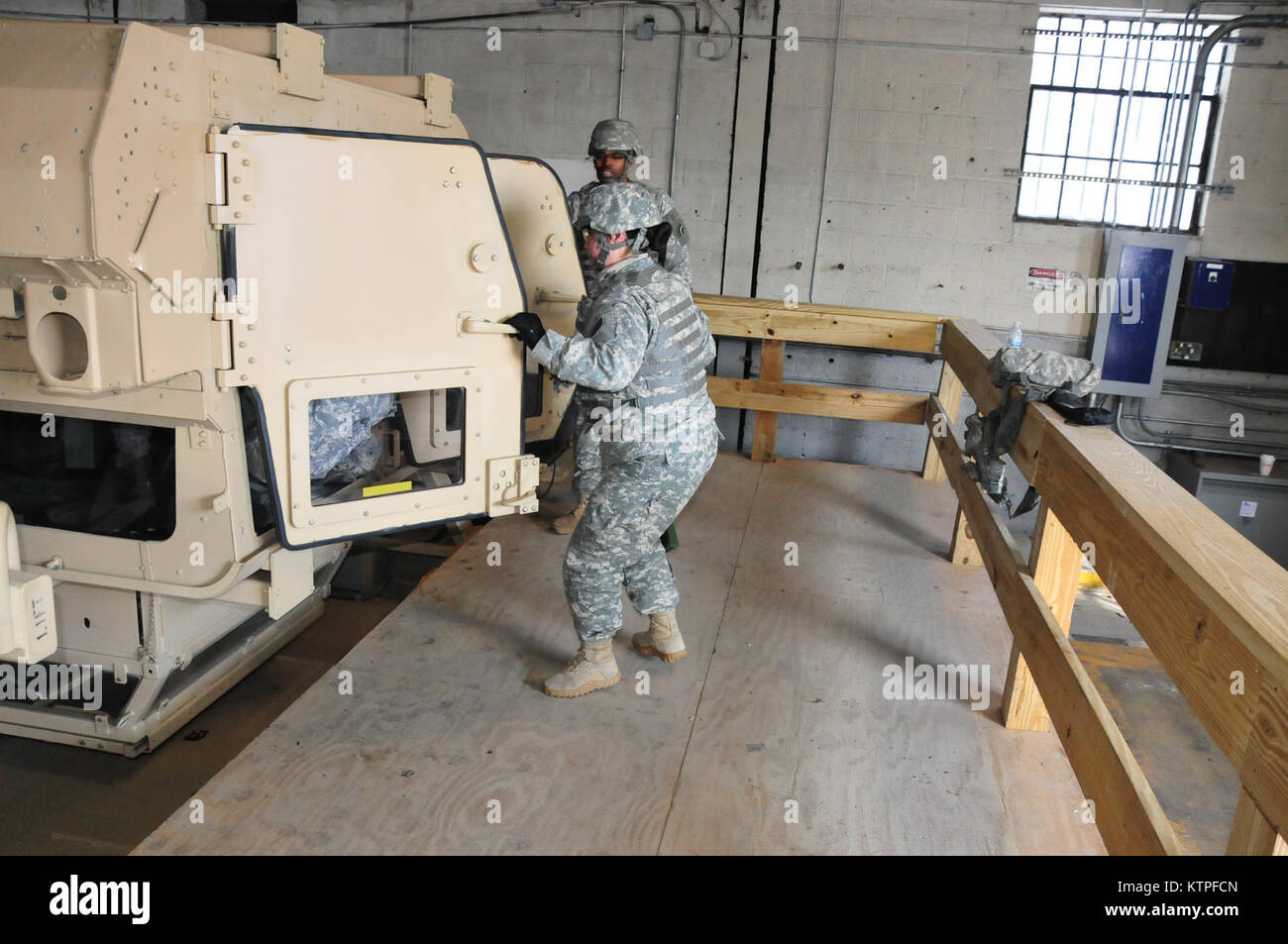 Sgt. 1st Class Theresa Barone-Lopez emerges from the Humvee rollover ...