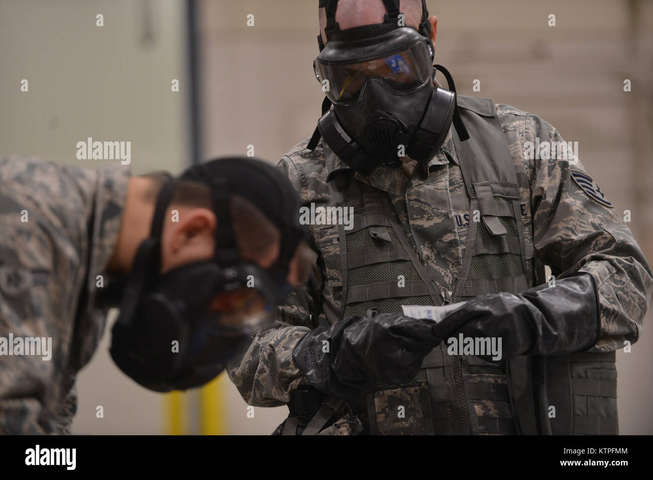 PERRY, GA - Staff Sergeant Micah Jarrett work to prepare a sample of an ...