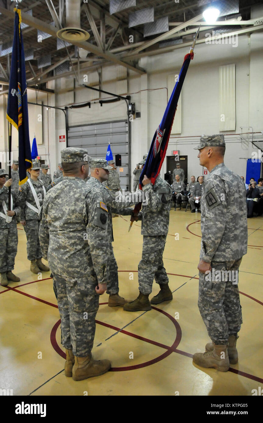 LATHAM -- Command Sgt. Maj. Joseph Mitchell hands the Recruiting and ...