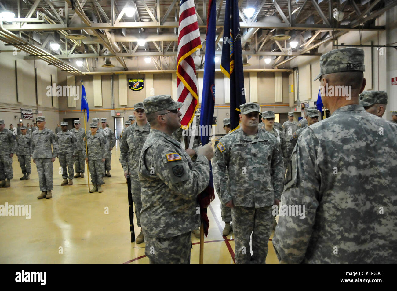 LATHAM -- Lt. Col. James Gonyo; (left) prepares to hand the Recruiting ...