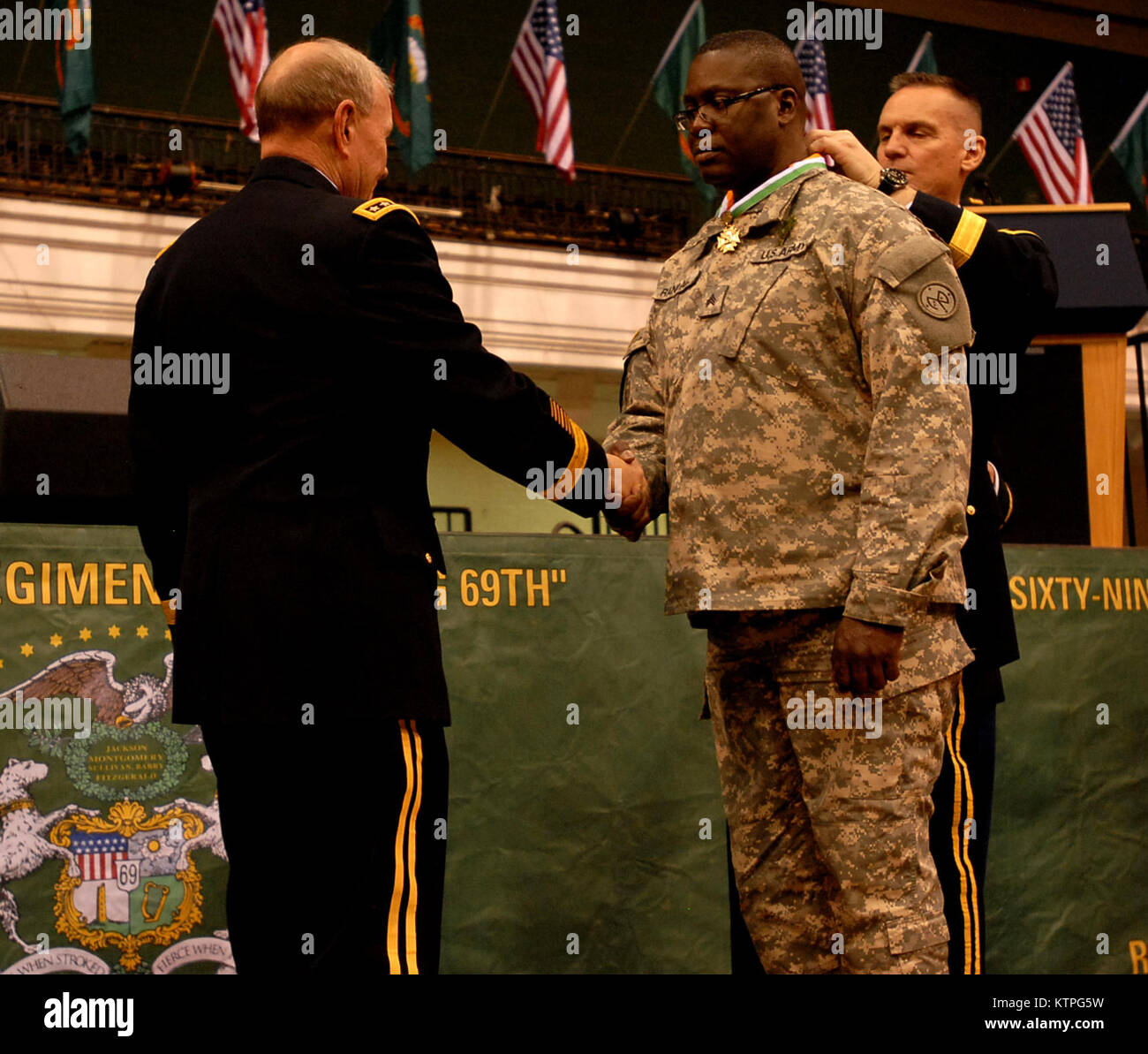 NEW YORK –Sgt. Marquise Randall accepts the 69th Infantry Regiment's ...