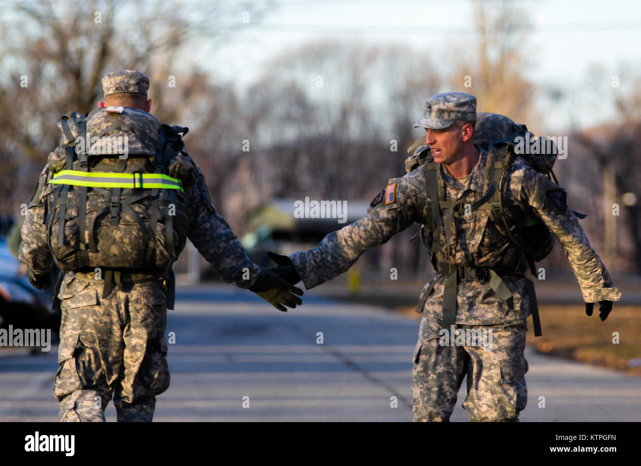 Staff Sgt. Nicholas Archibald (right), an infantryman with the ...