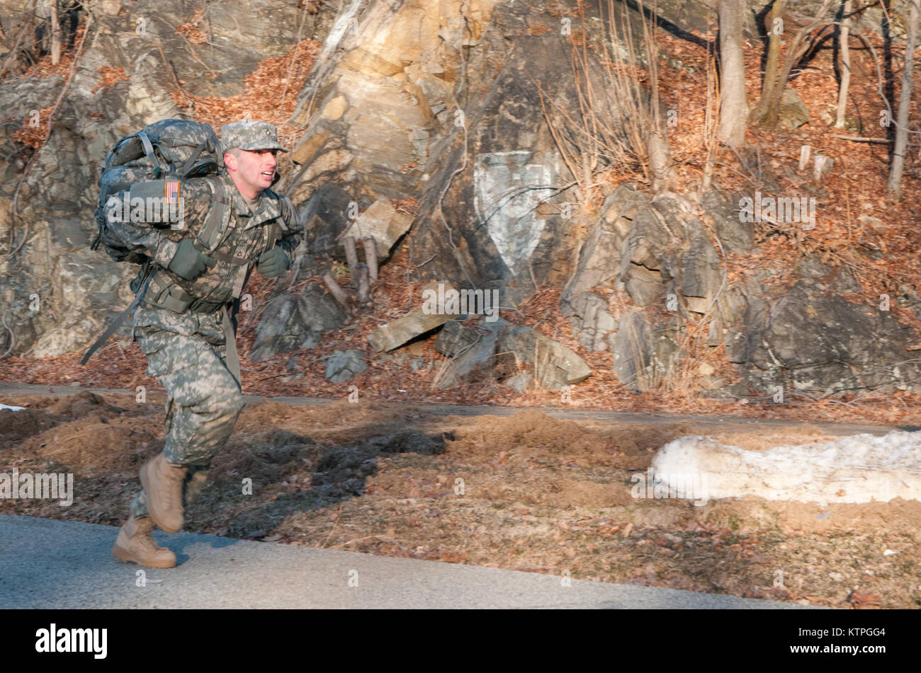 Pvt. 1st. Class Vincent Torres competes in the ruck march event of the ...