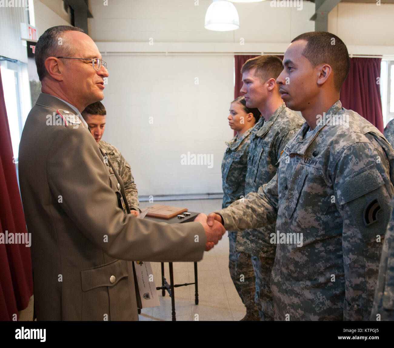 Lt. Col. Rolfe K. Metz of the German Army presents the German ...