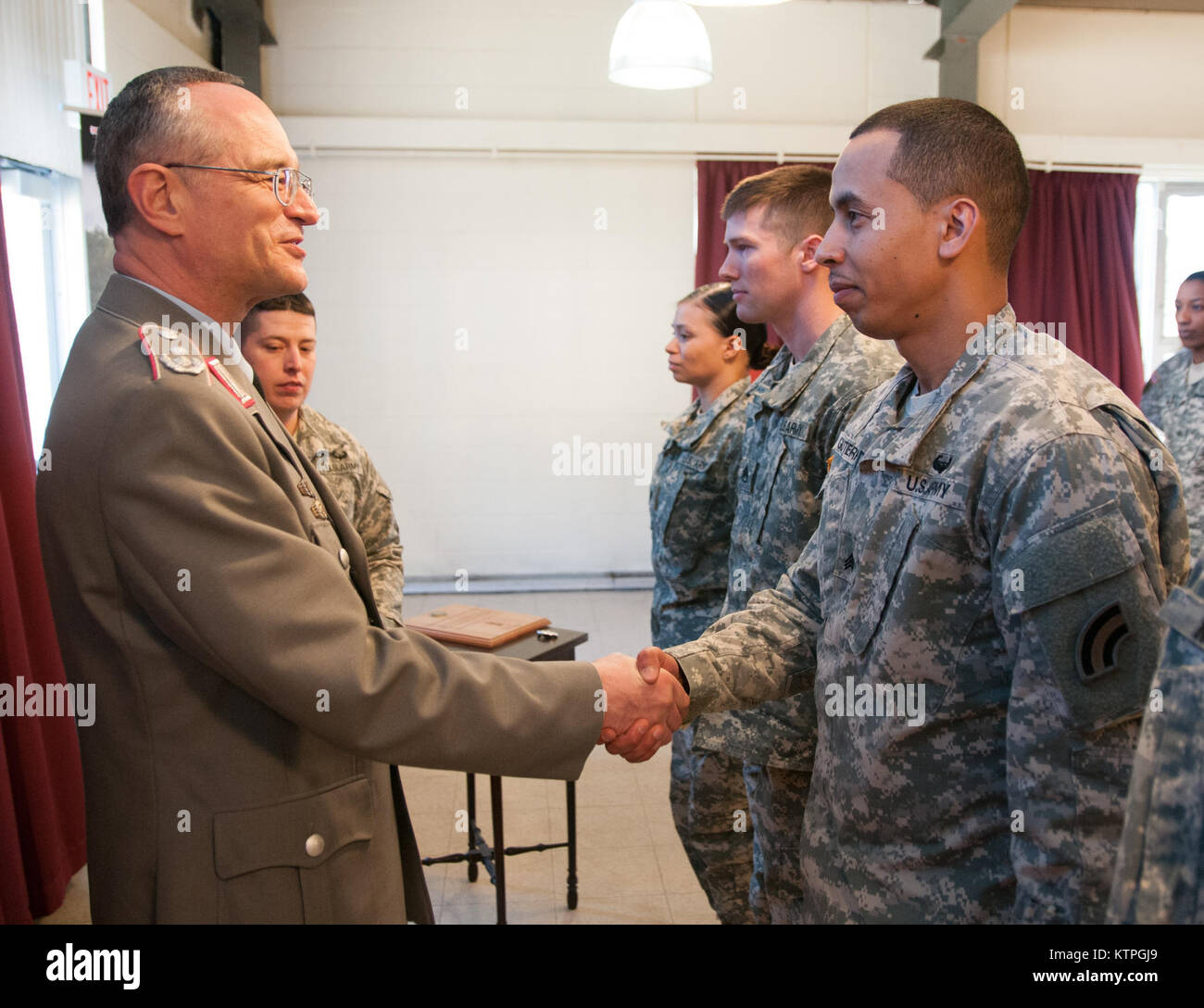 Lt. Col. Rolfe K. Metz of the German Army presents the German ...