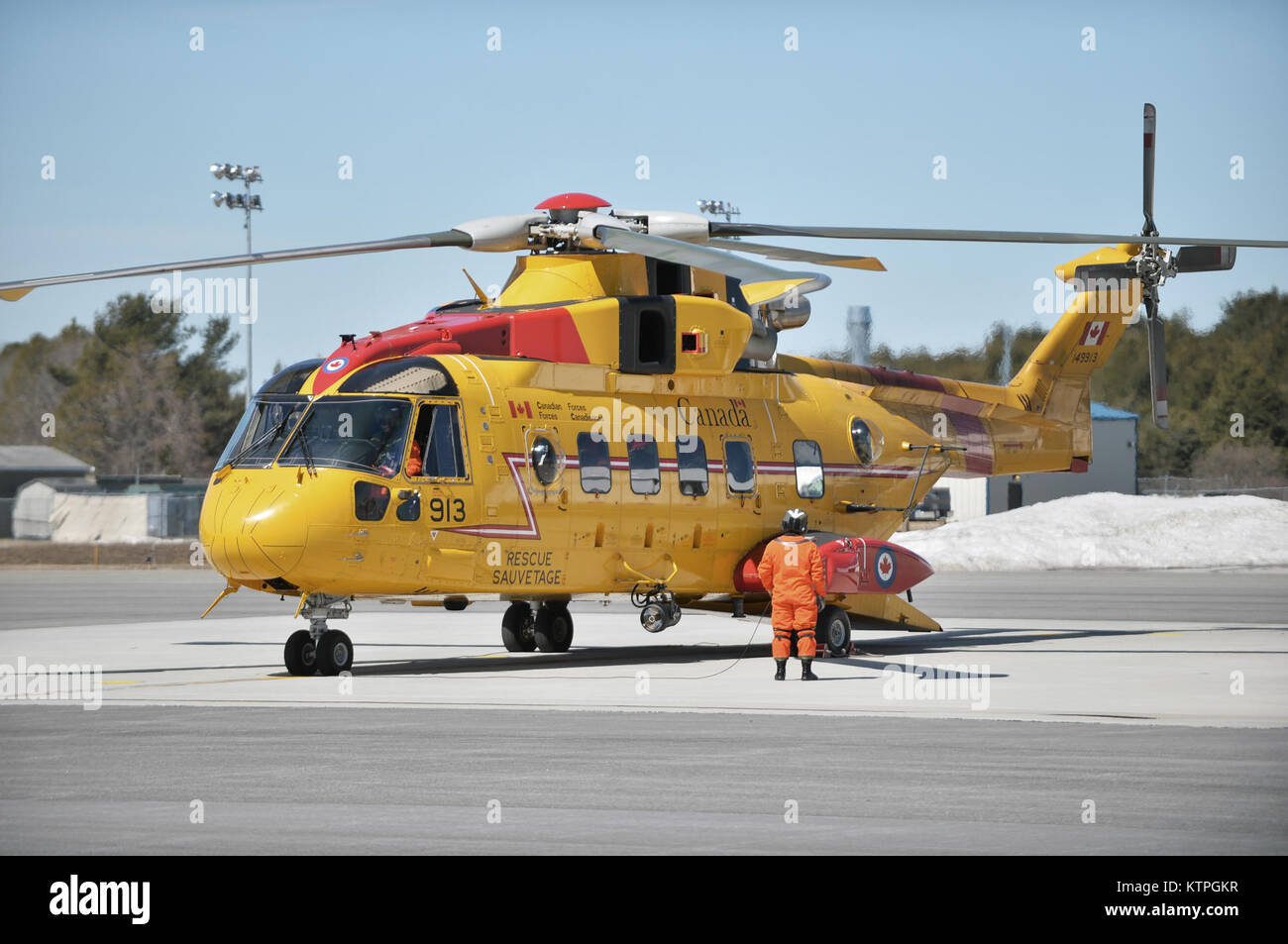 CAPE COD, MA - An Royal Canadian Air Force Search and Rescue aircrew member prepares to board an ...