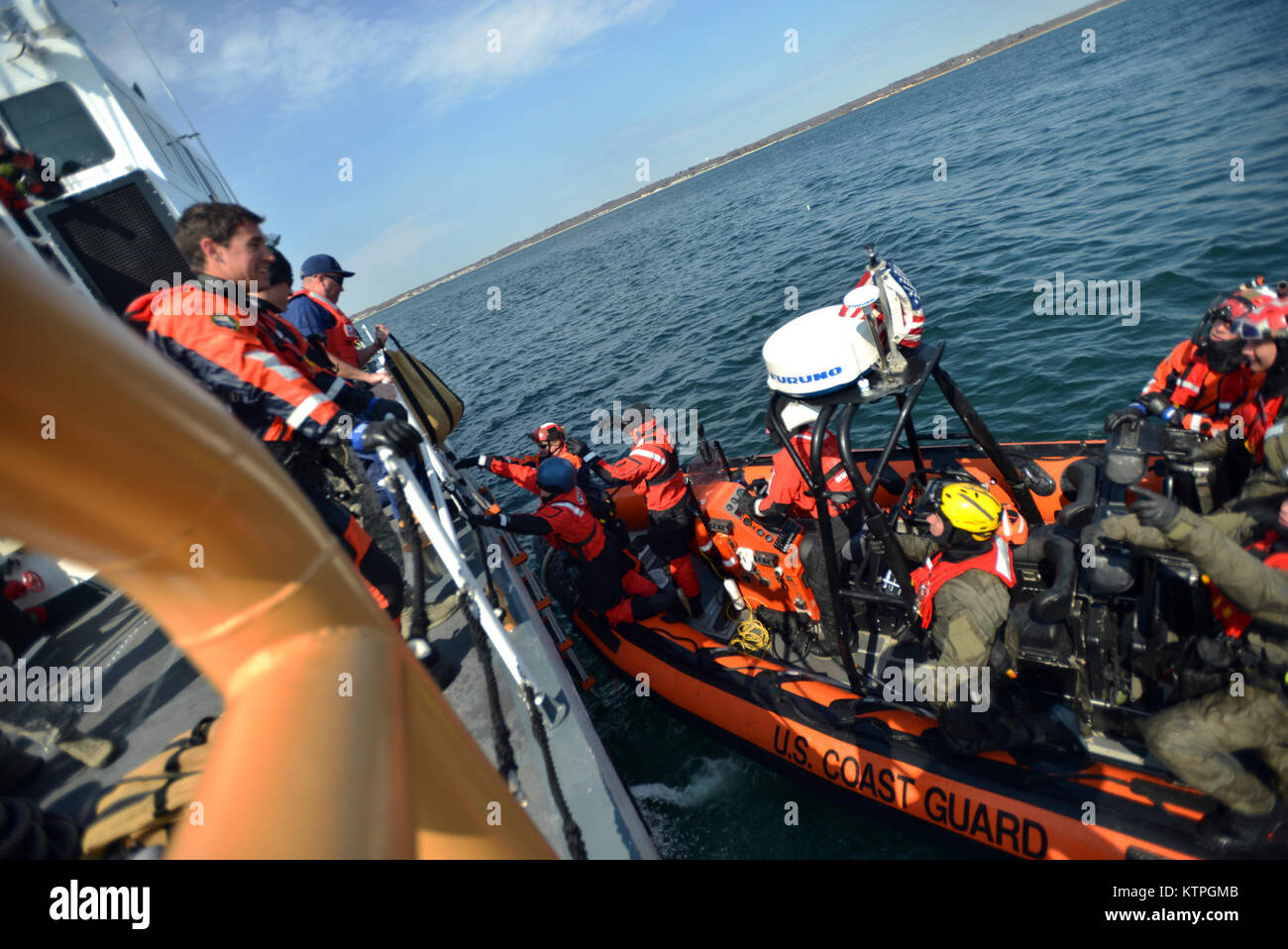 CAPE COD, MA - US Coast Guard sailors, along with members of the 103rd ...