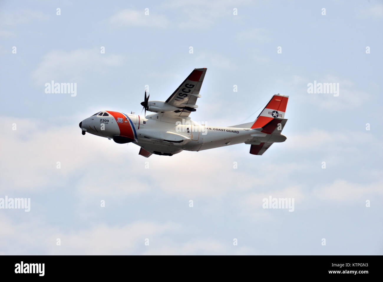 CAPE COD, MA - An HC-144 Ocean Sentry from Air Station Cape Cod passes ...