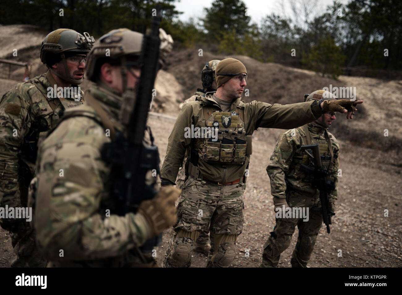 WESTHAMPTON BEACH, NY - Technical Sergeant Jason Cangemi briefs members ...