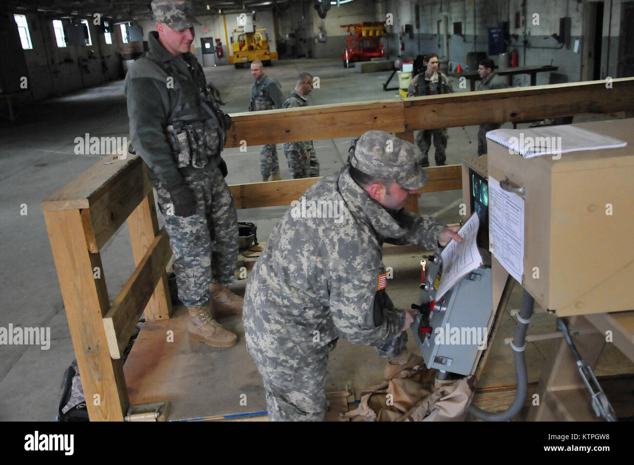 Sgt. 1st Class Nicholas Pardi controls the spin of the HEAT rollover ...