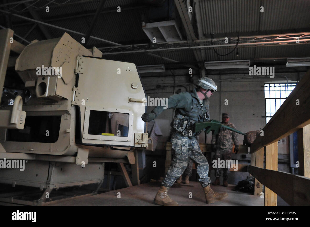 Pfc. Kyle Winne, 42nd Inf. Div. Headquarters Services Company, egresses ...