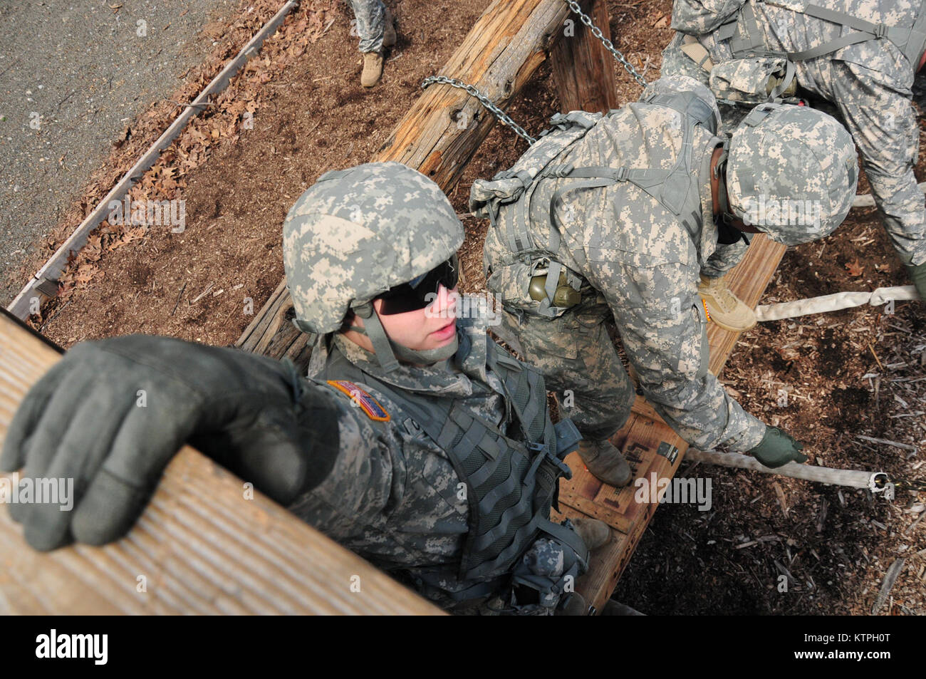 42nd Inf. Div. Soldiers from Headquarters Services Company determine ...