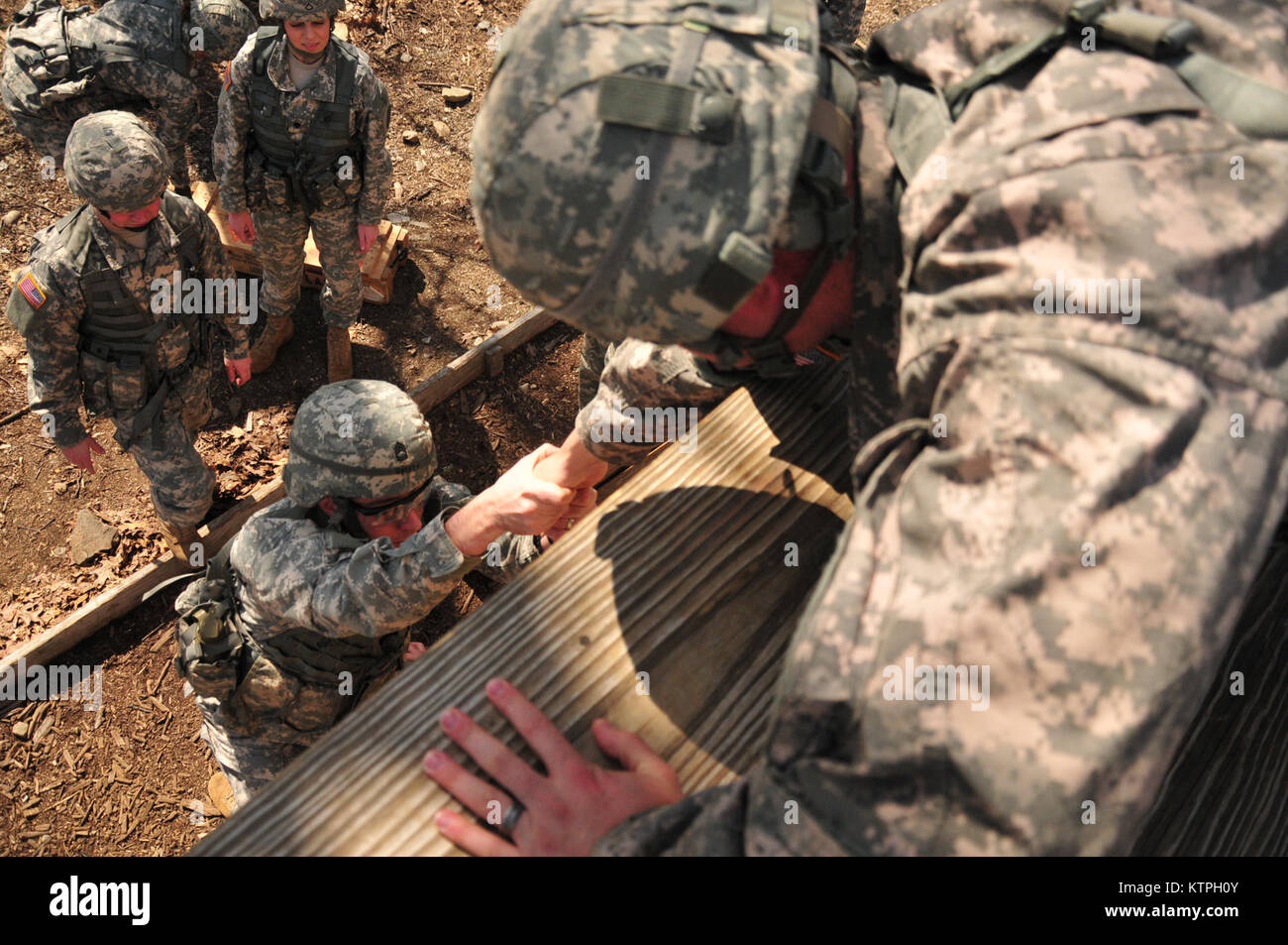 42nd Inf. Div. Soldiers from Headquarters Services Company determine ...