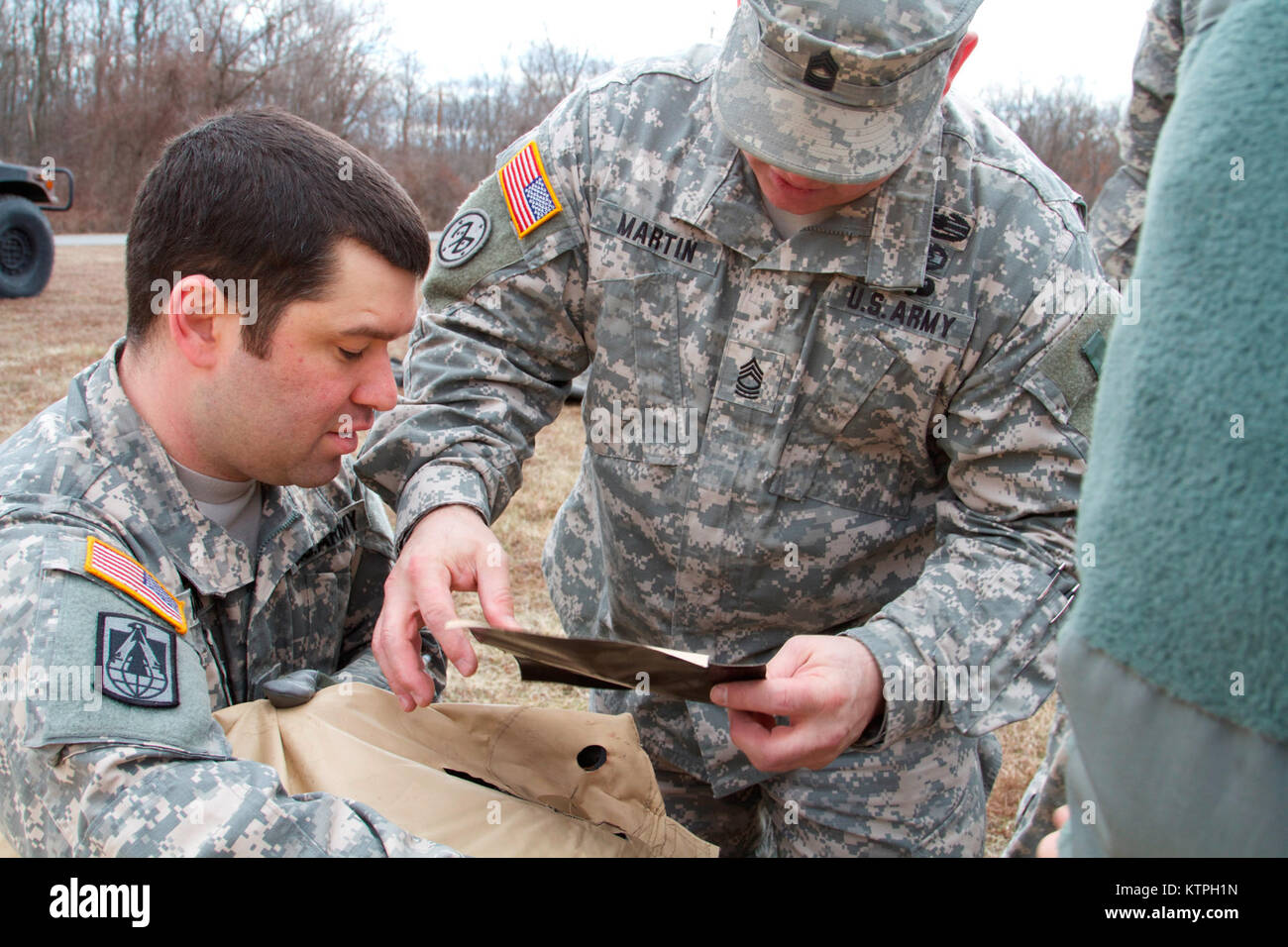 Sgt. Andrew Mesick, left, of the Headquarters and Headquarters Company ...