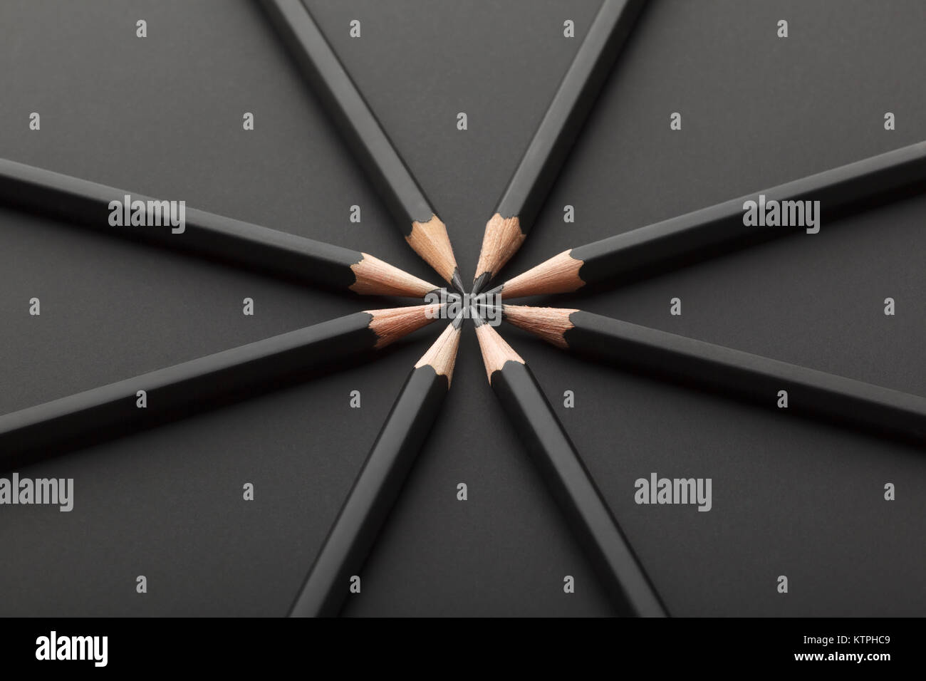 Set of black pencils on black background Stock Photo - Alamy