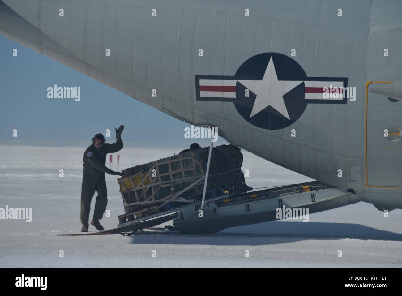 RAVEN CAMP, Greenland -- Master Sgt. Randy Powell loads a training ...