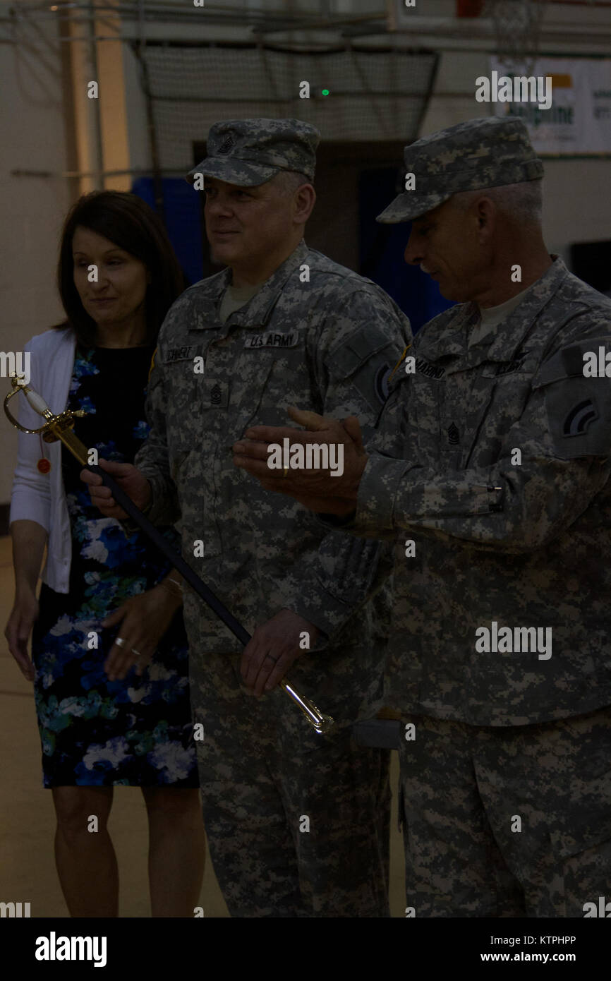 Sgt. Maj. John Schubert, center, the 42nd Combat Aviation Brigade ...
