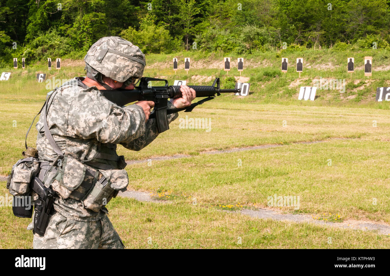Service members compete in the Combat Rifleman Excellence-in ...