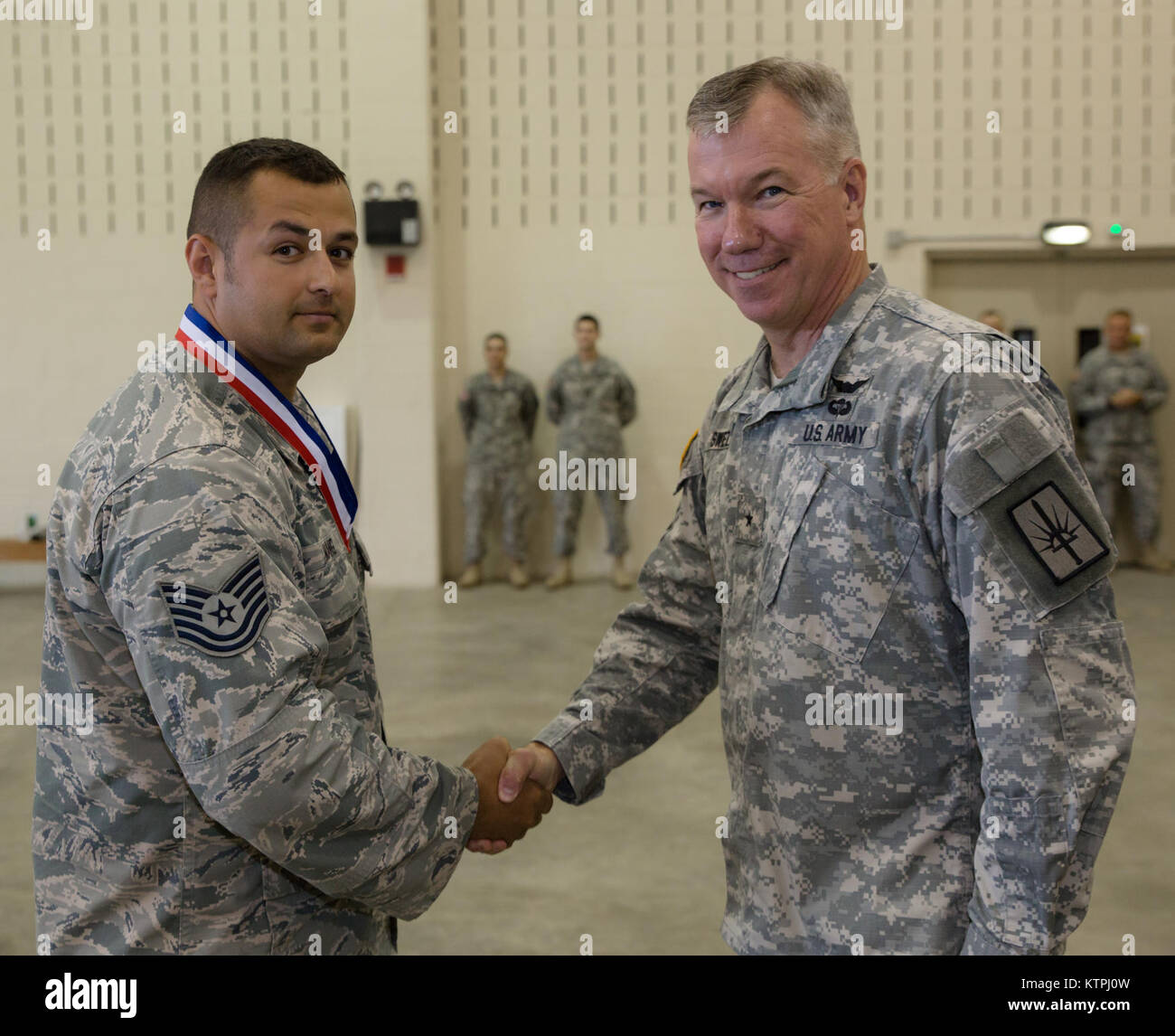 Tech. Sgt. Ryan Mang, of the 107th Airlift Wing, poses with Brig. Gen ...