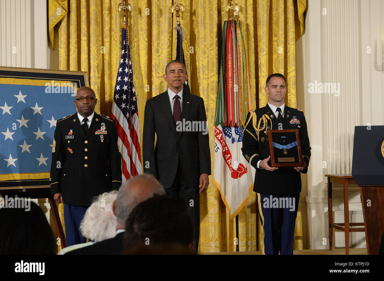 New York Army National Guard Command Sgt. Maj. Louis Wilson accepts the ...
