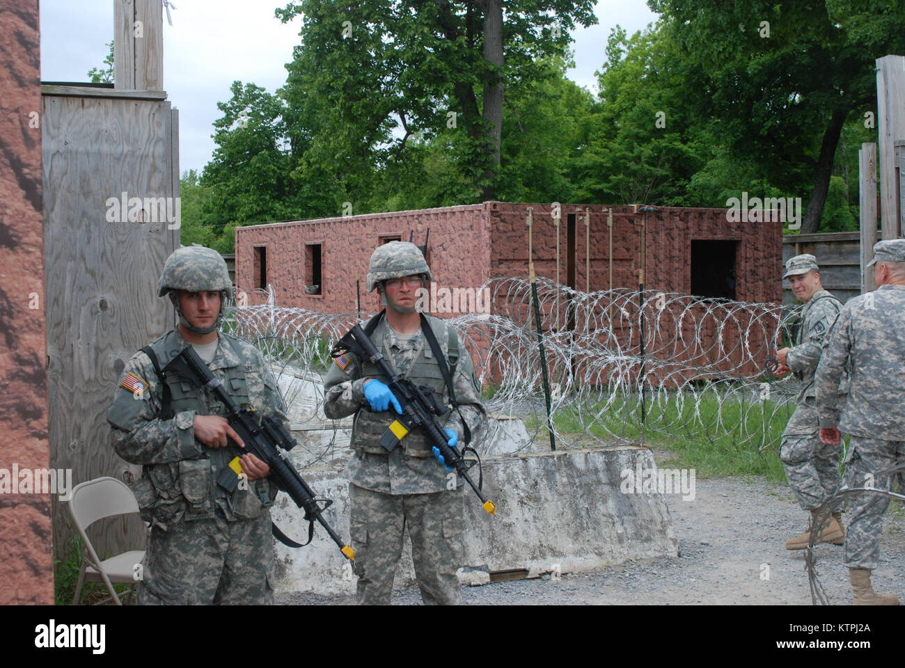 Soldiers from the 102nd Military Police Battalion, Headquarters ...