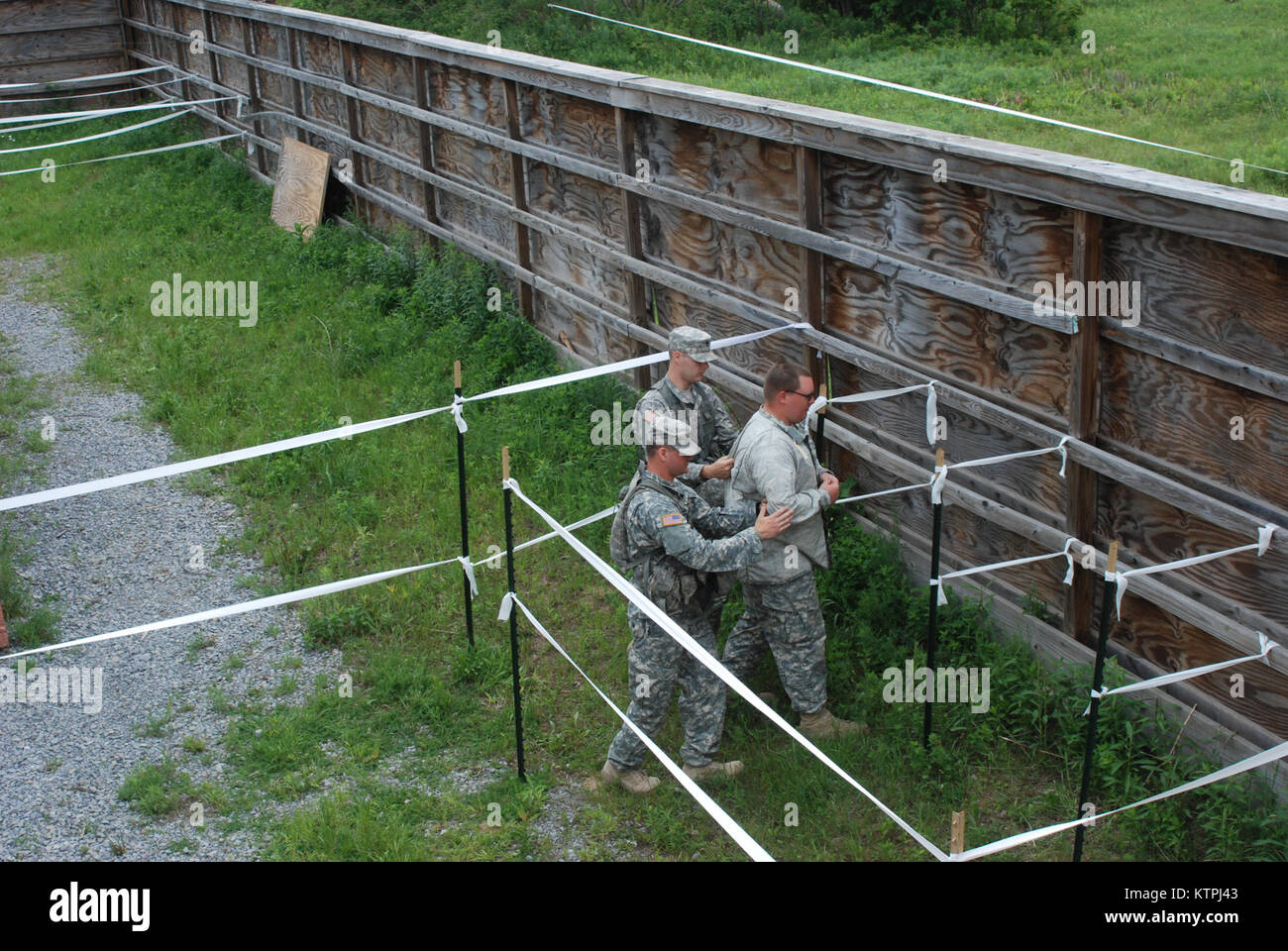 Soldiers from the 102nd Military Police Battalion, Headquarters ...