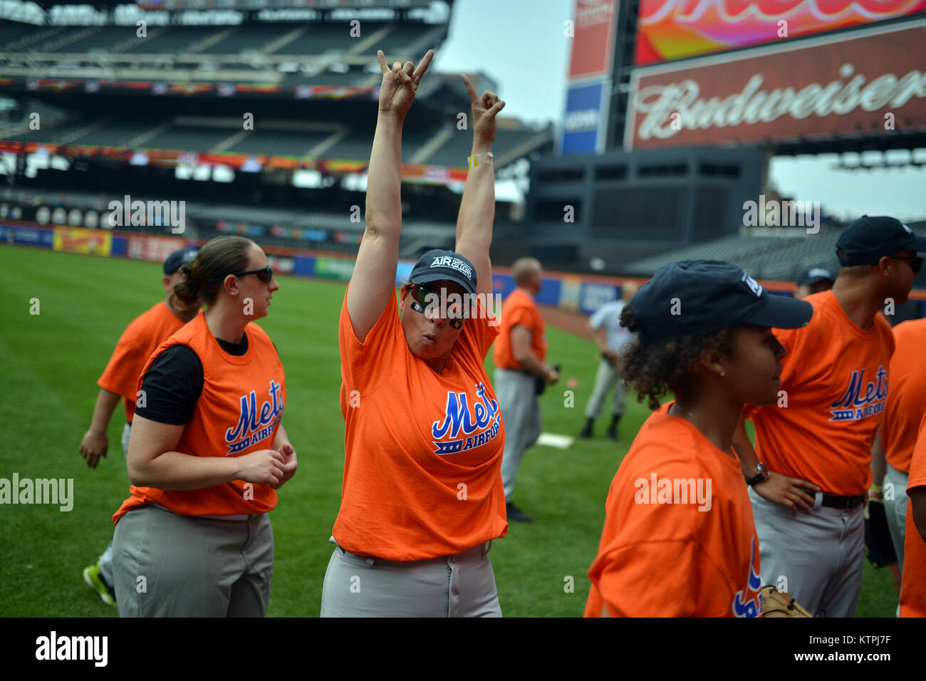 NEW YORK, NY - Wearing New York Mets jerseys, service members from the ...