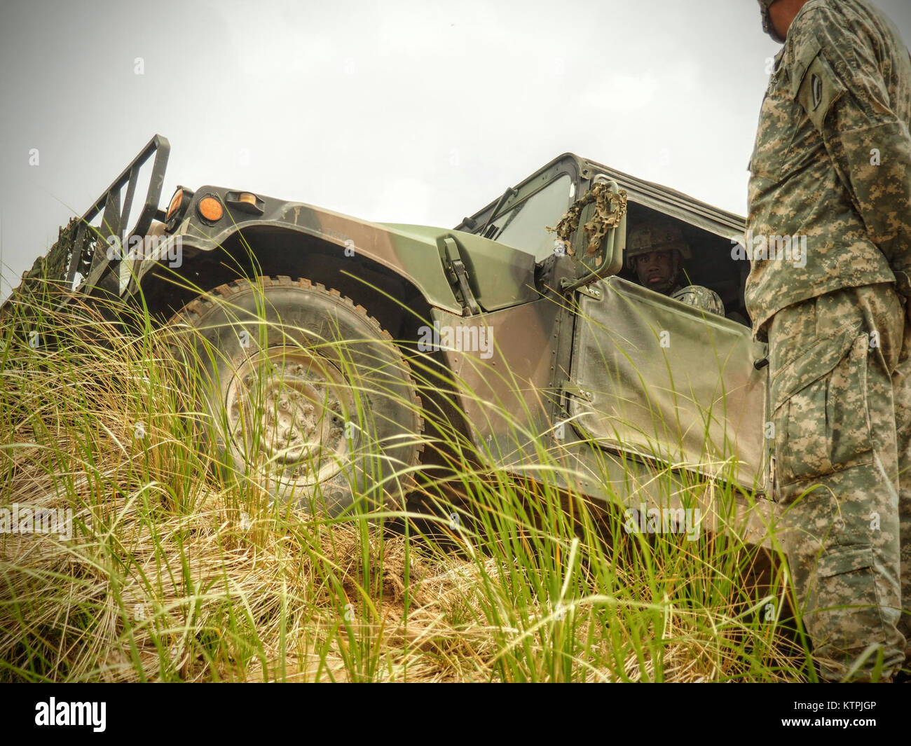 As an instructor watches, Spc. Shaun Malcolm of the 42nd Infantry ...