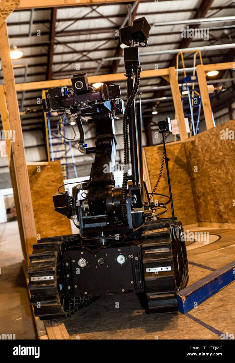 An operator controlled robot is run through an obstacle course and ...