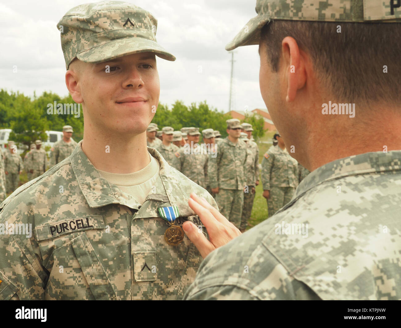 Pvt. Purcell receives an award for his efforts during the 42nd Infantry ...
