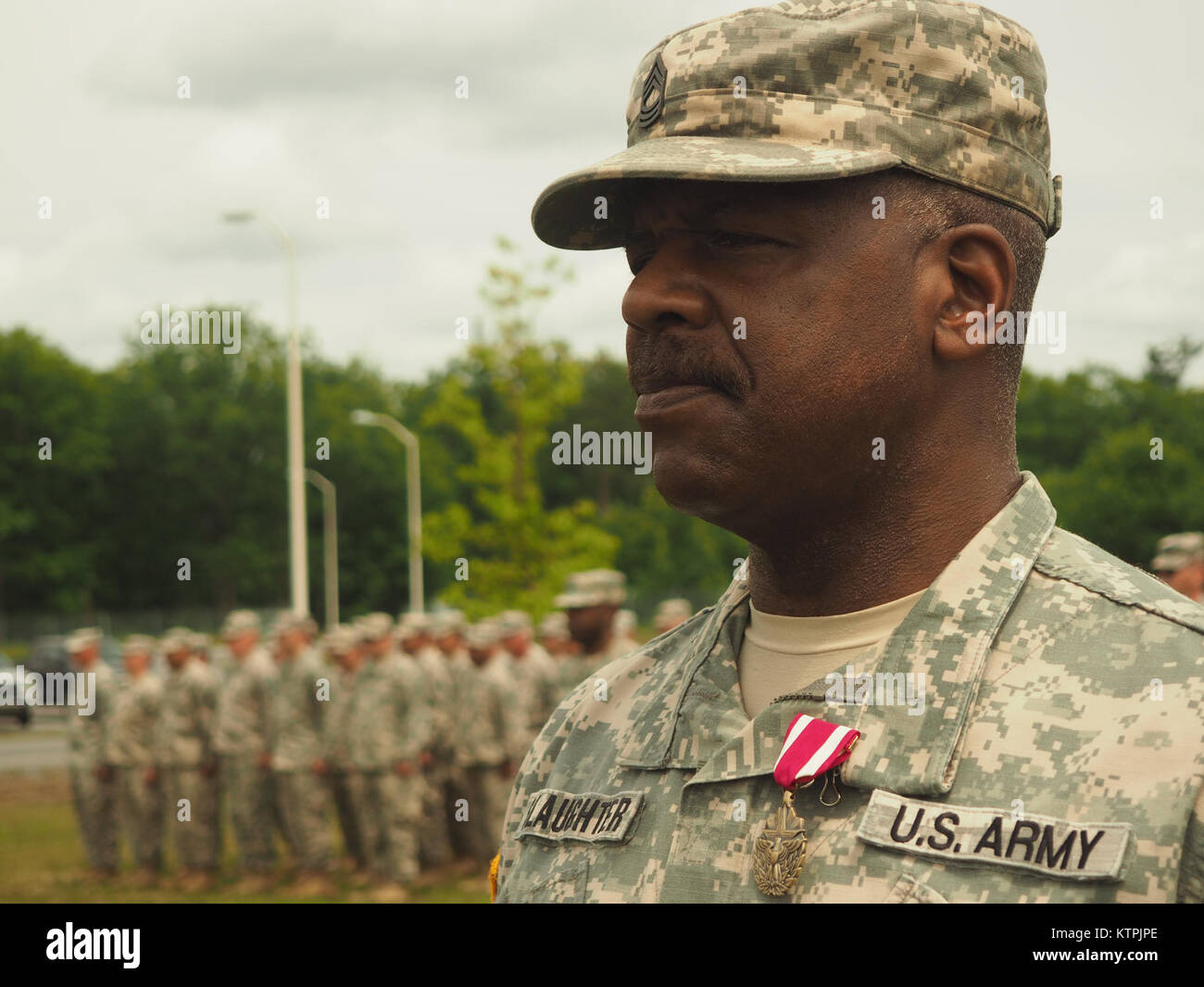 Master Sgt. Michael Slaughter receives an award after 35 years of ...