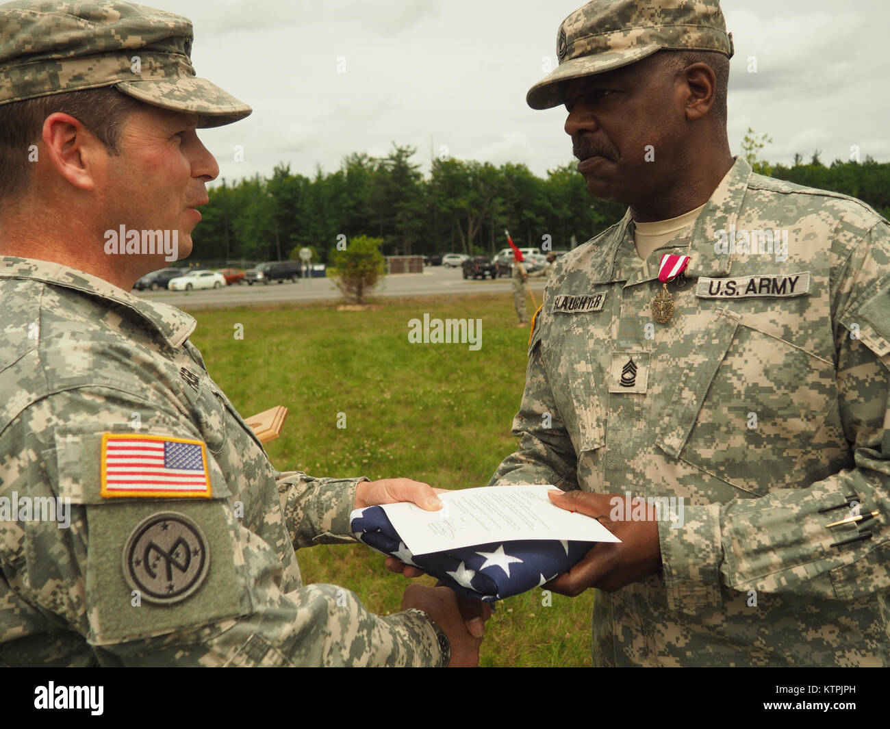 Master Sgt. Michael Slaughter receives an award after 35 years of ...