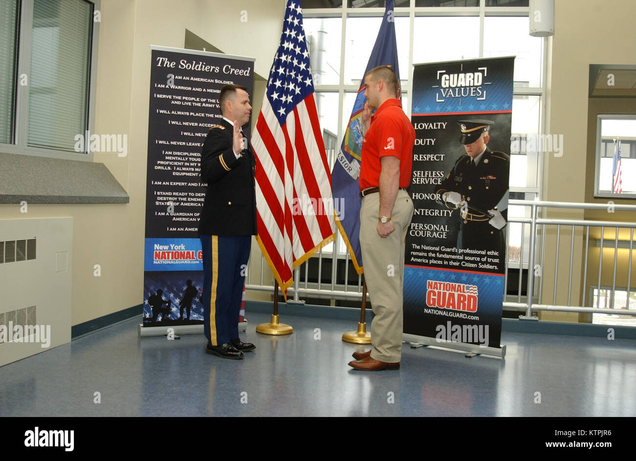 Lt. Col. Steve Rowe administers the Oath of Enlistment to New York Army ...