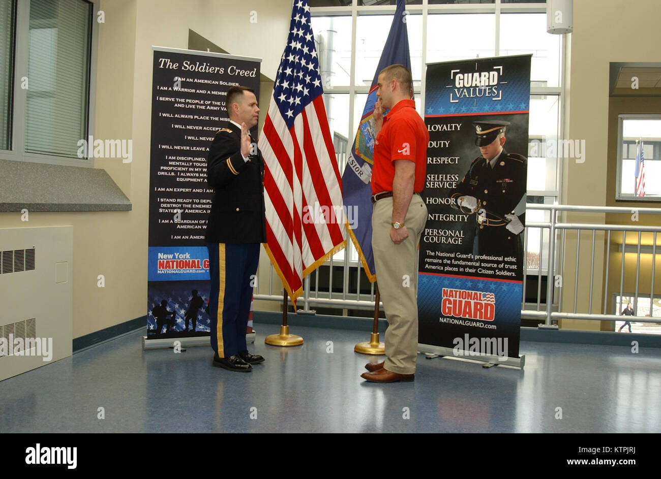 Lt. Col. Steve Rowe administers the Oath of Enlistment to New York Army ...