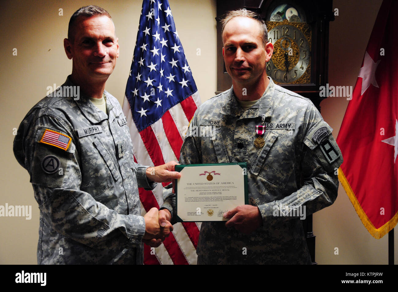 Maj. Gen. Patrick Murphy presents the Meritorious Service Medal ...