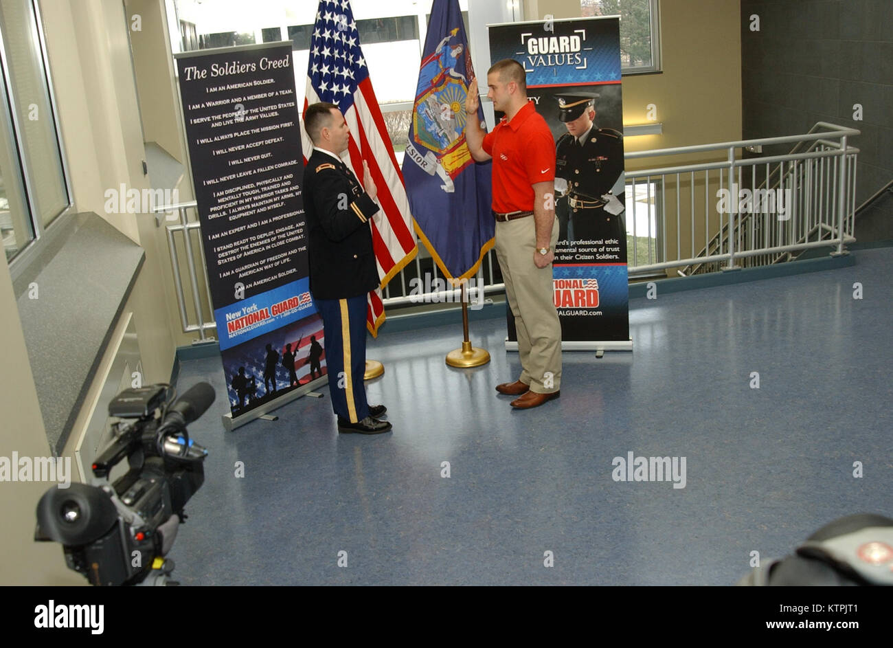 Lt. Col. Steve Rowe administers the Oath of Enlistment to New York Army ...