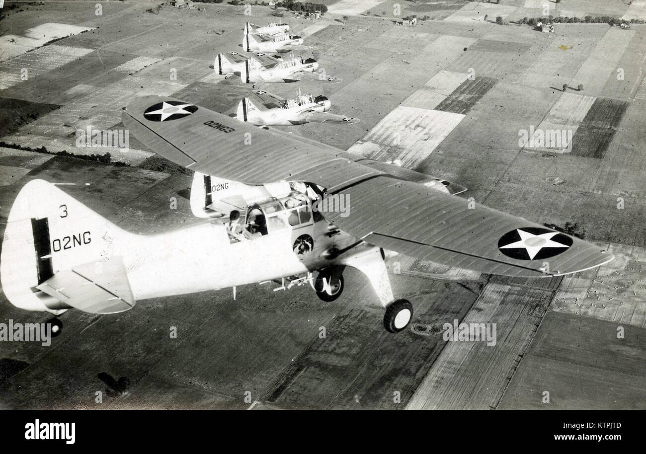 0-46 and 0-47 aircraft belonging to the 102nd Observation Squadron fly ...