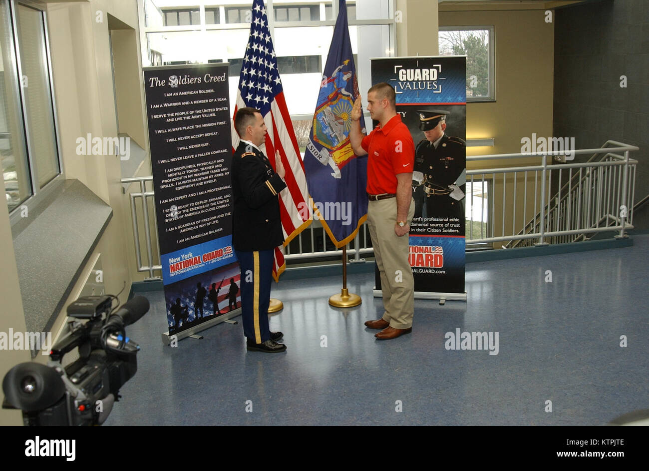 Lt. Col. Steve Rowe administers the Oath of Enlistment to New York Army ...
